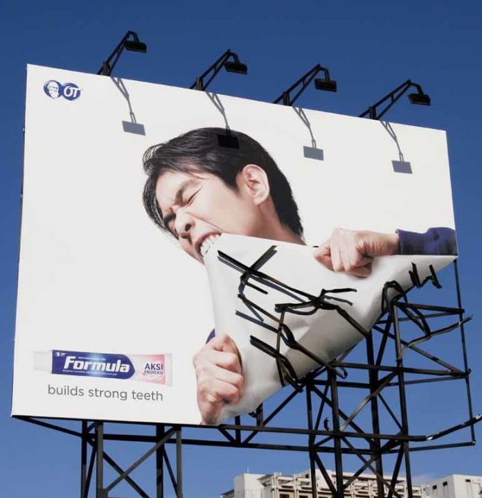 Formula Toothpaste Builds Strong Teeth Billboard Ad | Talk Cock Sing Song